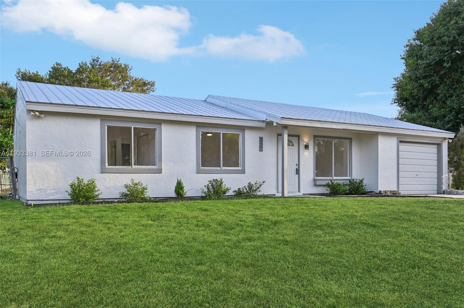 337 SW Cherryhill Road, Port St Lucie FL 34953